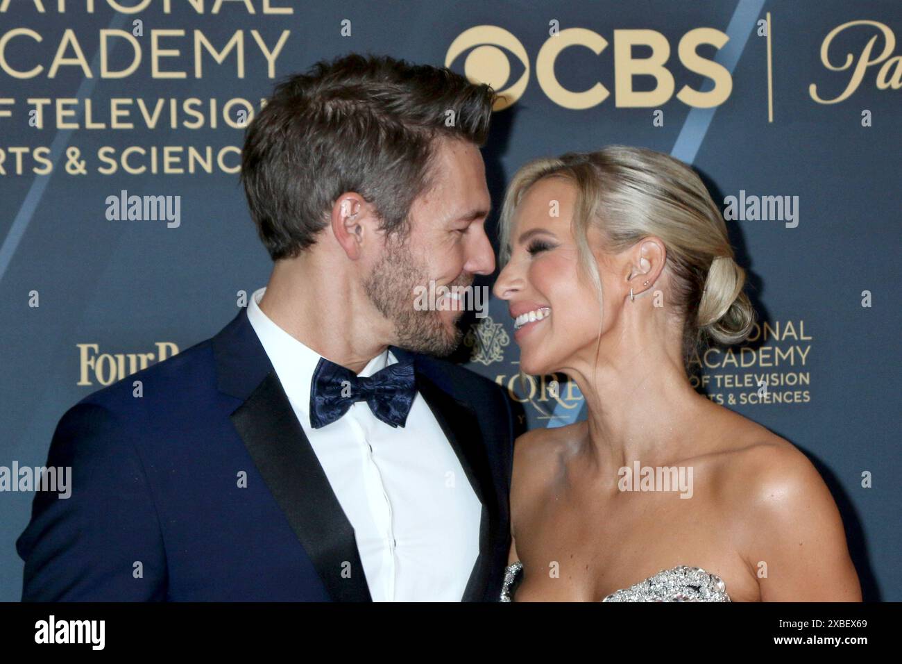 LOS ANGELES - JUN 7: Scott Clifton, Elle Anderson arrives at the 51st ...
