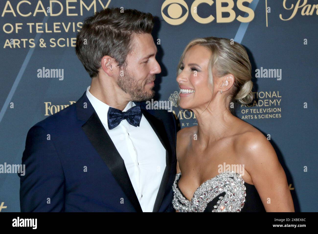 LOS ANGELES - JUN 7: Scott Clifton, Elle Anderson arrives at the 51st ...