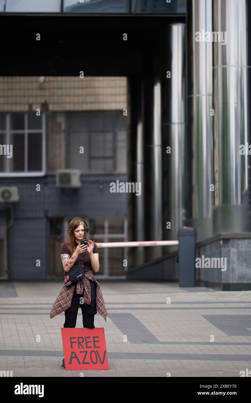 Ukrainian girl demonstrating with a sign "Free Azov" in Kyiv - 9 June ...