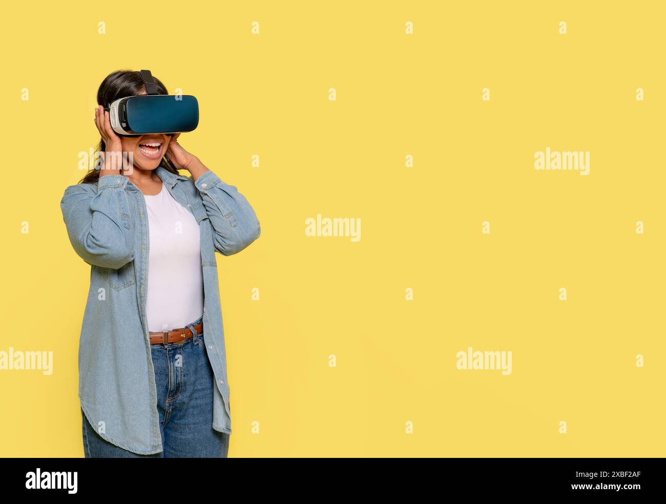 female in modern VR headset exploring virtual reality universe on ...