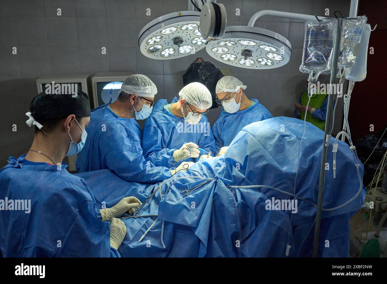 Surgical Team Performing Procedure in Hospital Operating Room Stock ...