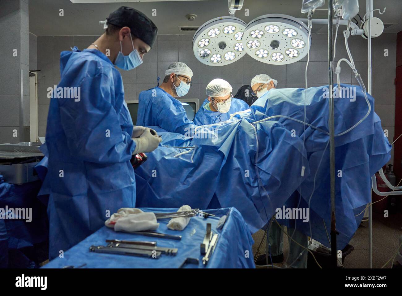 Healthcare team performing complex hi-res stock photography and images ...