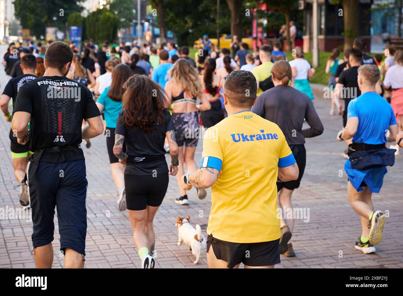 Large group of Ukrainian runners running the urban marathon distance in ...
