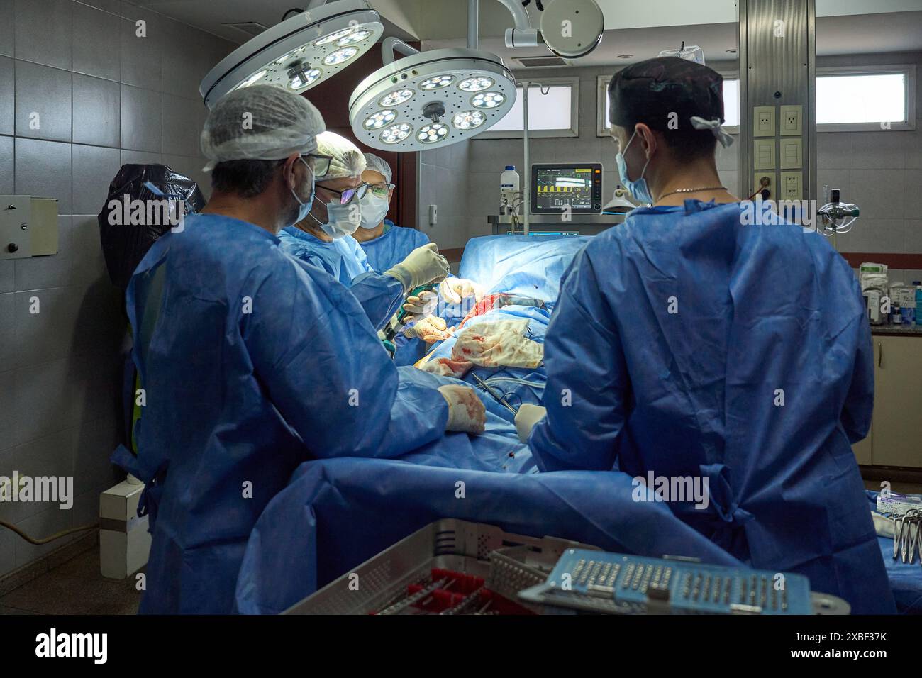 Medical Professionals Performing Surgery in a Hospital Operating Room ...