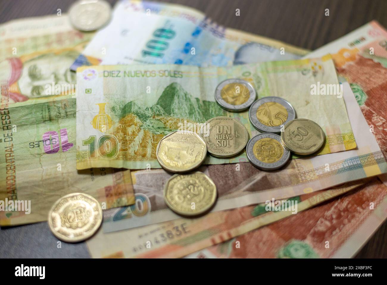 various coins and paper banknotes of Peru Stock Photo - Alamy