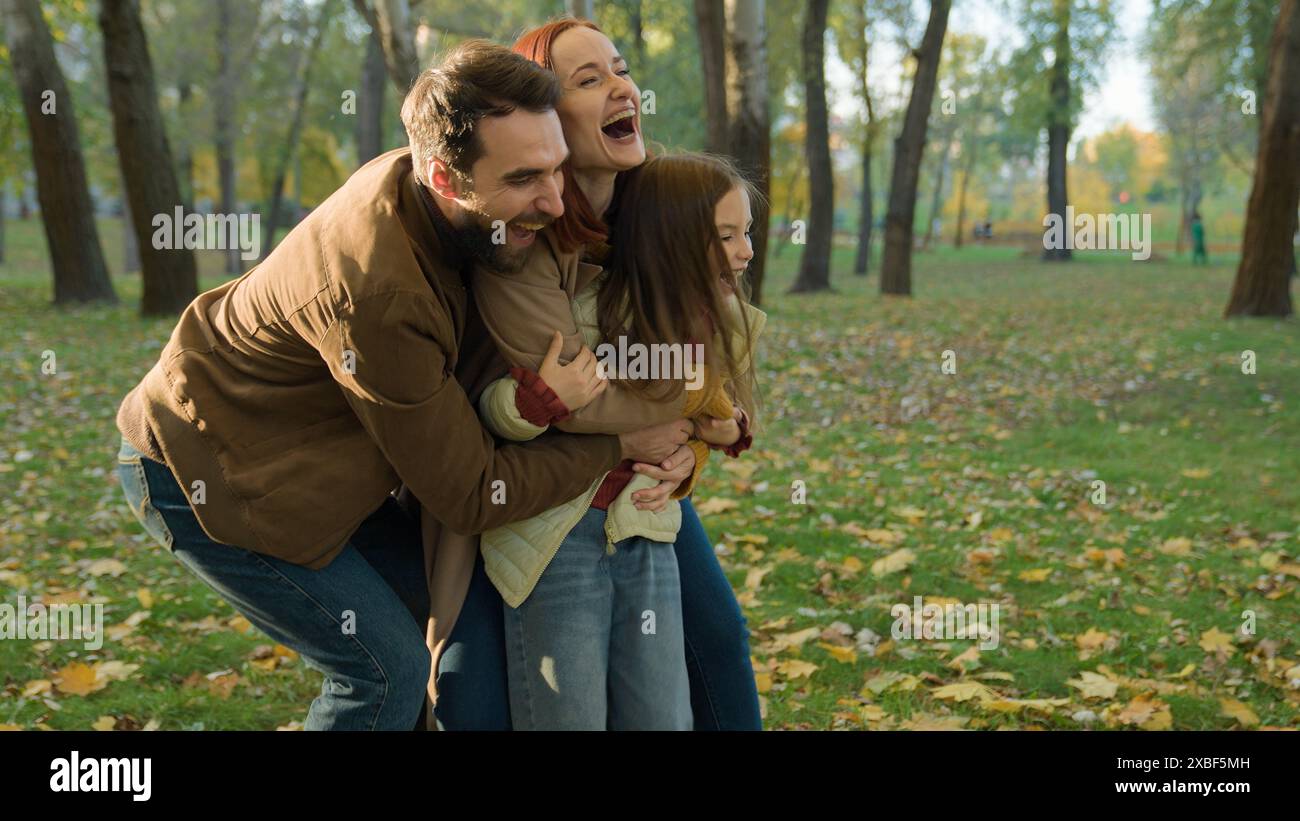 Happy family hugging together love adopted custody little child kid ...