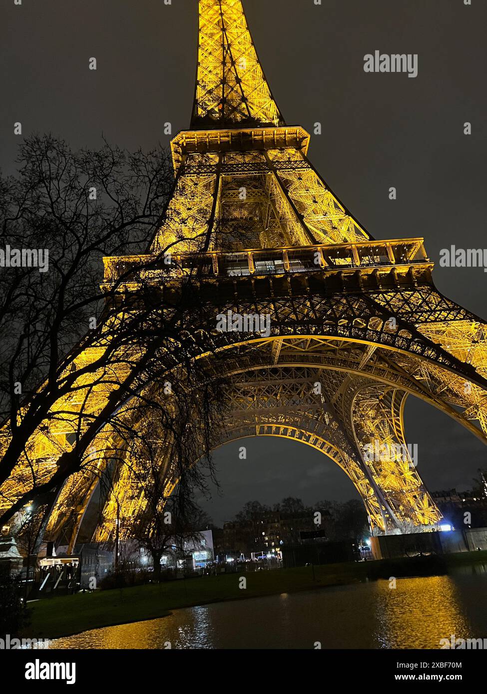 Beautiful illuminated Eiffel tower against night sky, low angle view Stock Photo - Alamy