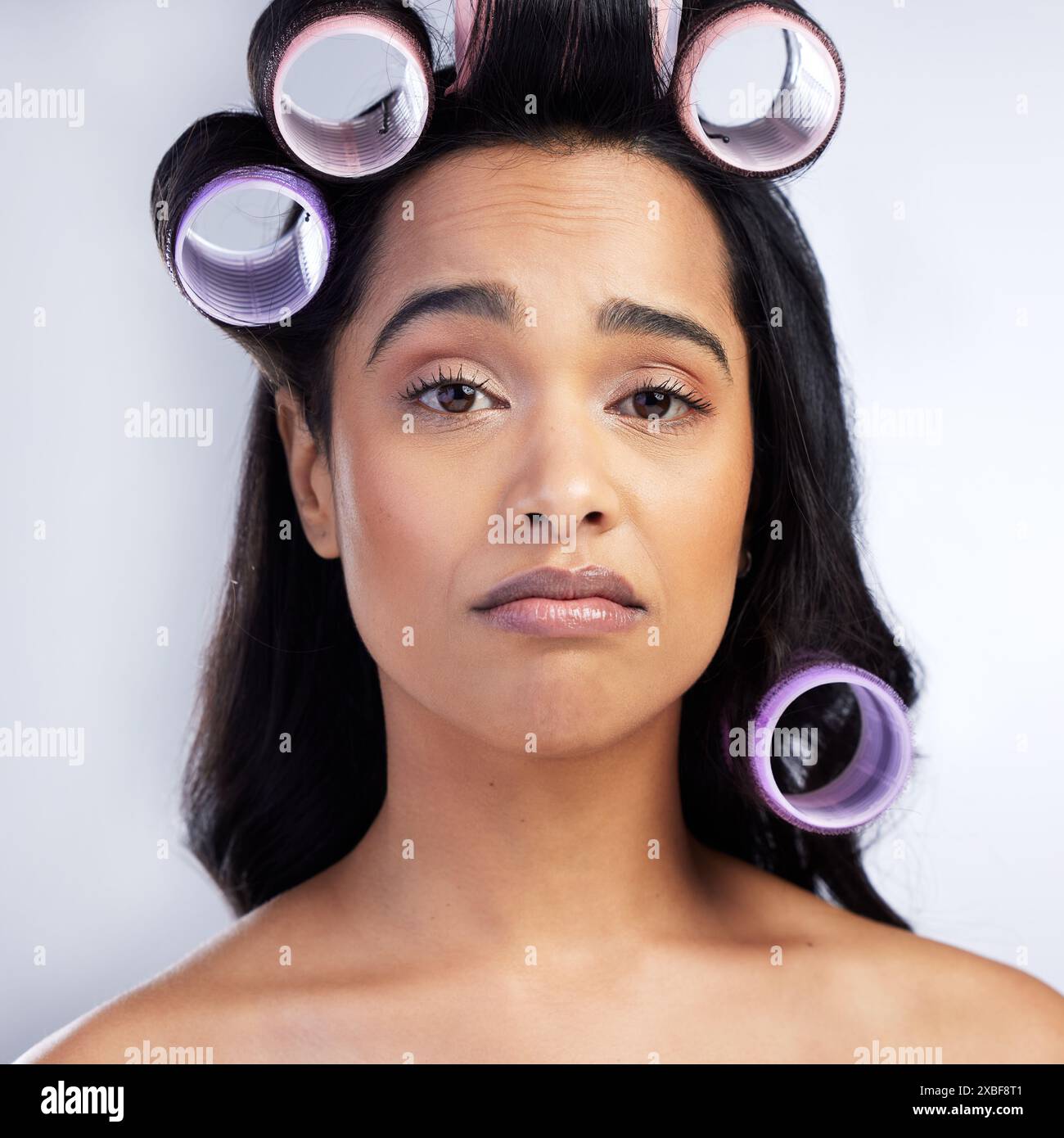 Face, hair care rollers and woman with problem for transformation fail ...