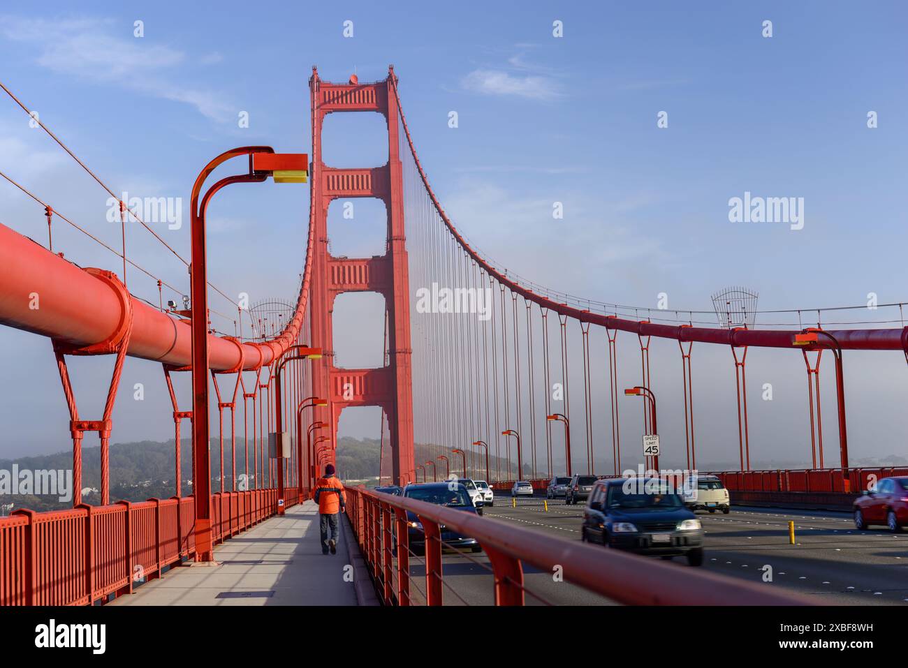 Tourists and cars on Golden Gate Bridge. San Francisco. California ...