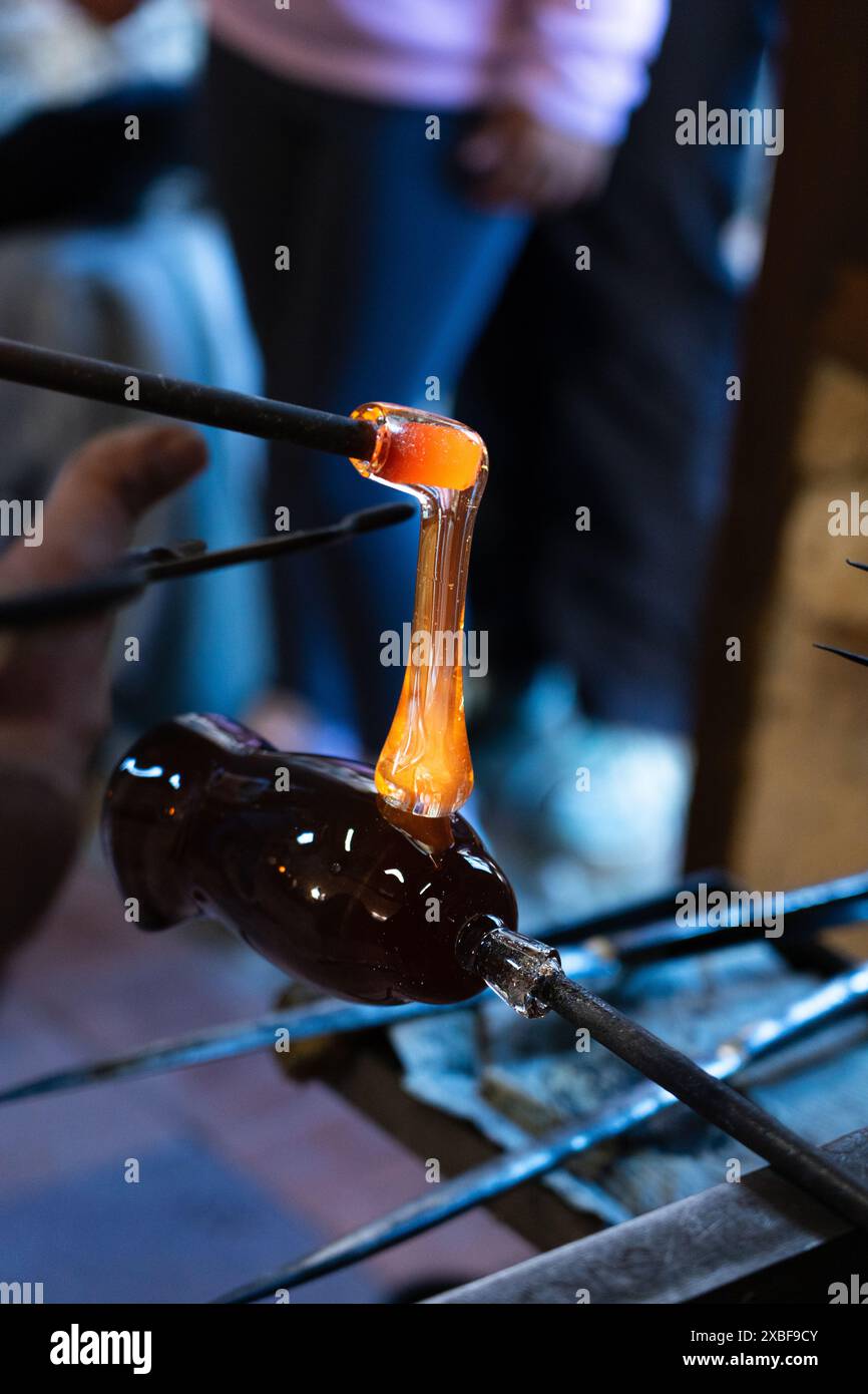 Jug in the process of creation with blown glass Stock Photo - Alamy