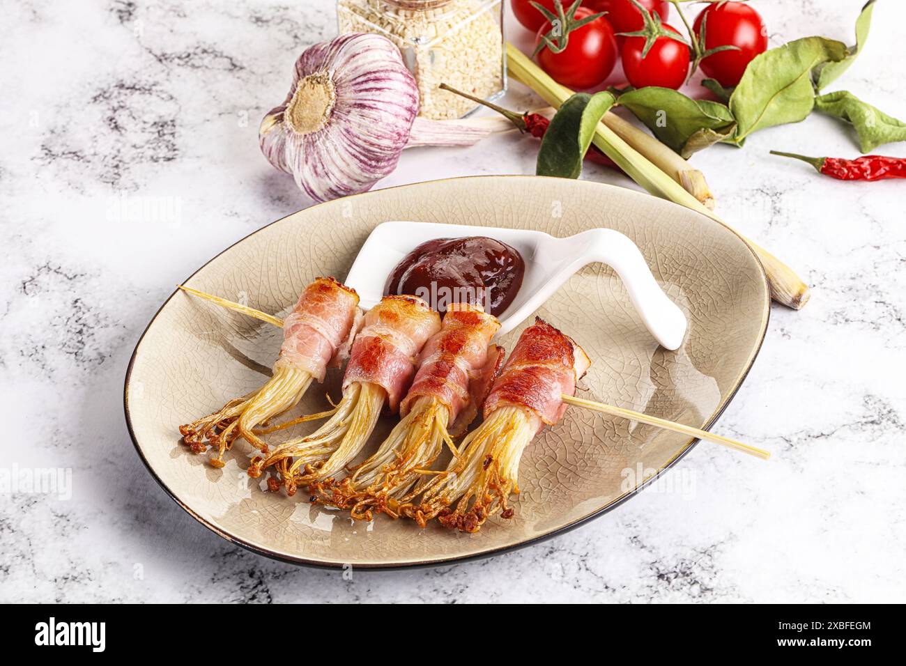 Tasty Grilled enoki mushroom with bacon Stock Photo - Alamy