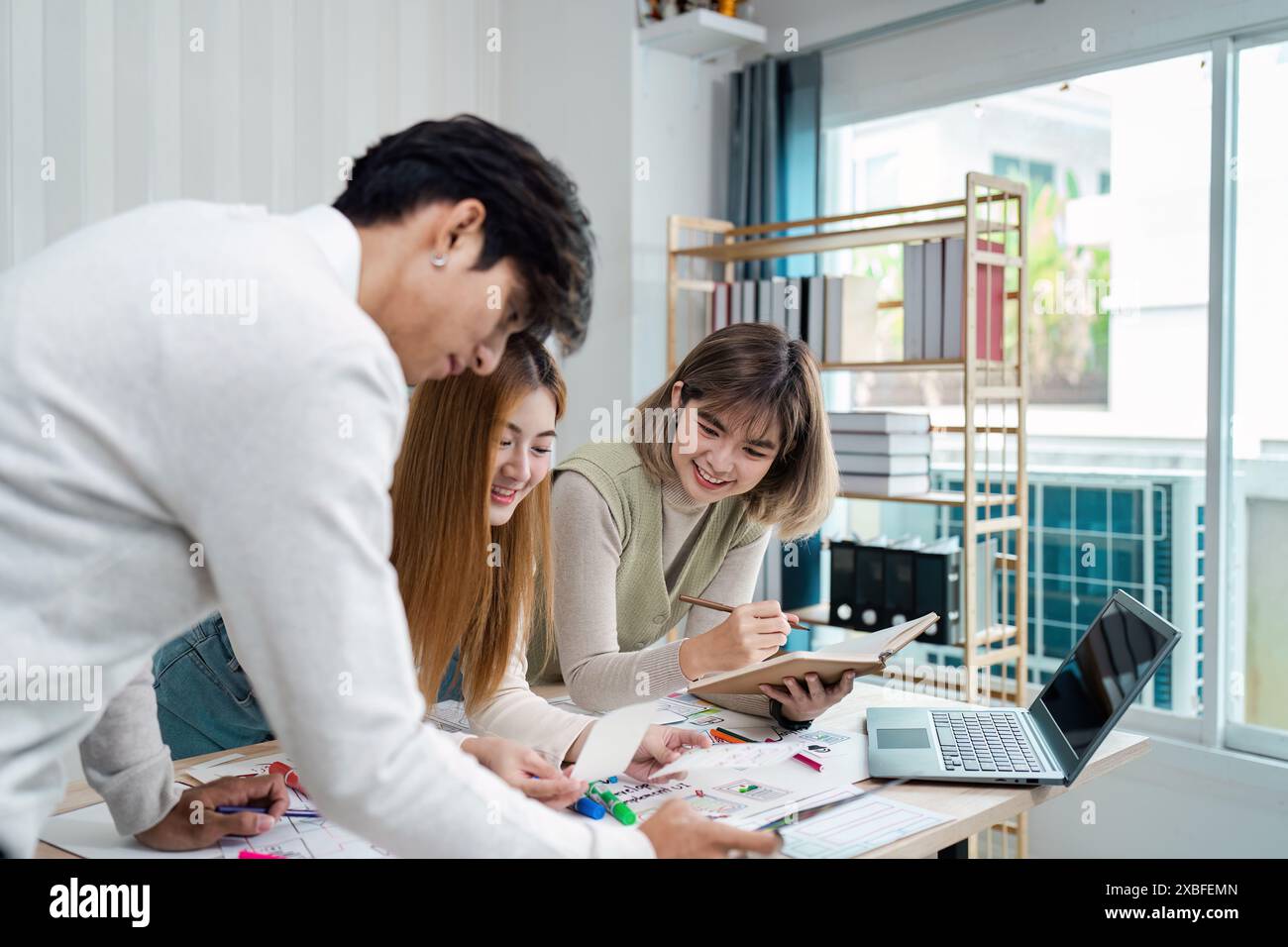 Creative Team collaboration on UX UI Design Project in Modern Office ...