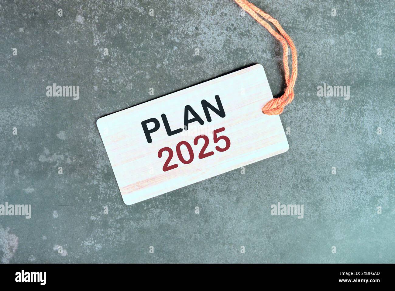 Planning goals and success concept. Text PLAN 2025 on a light card on a ...
