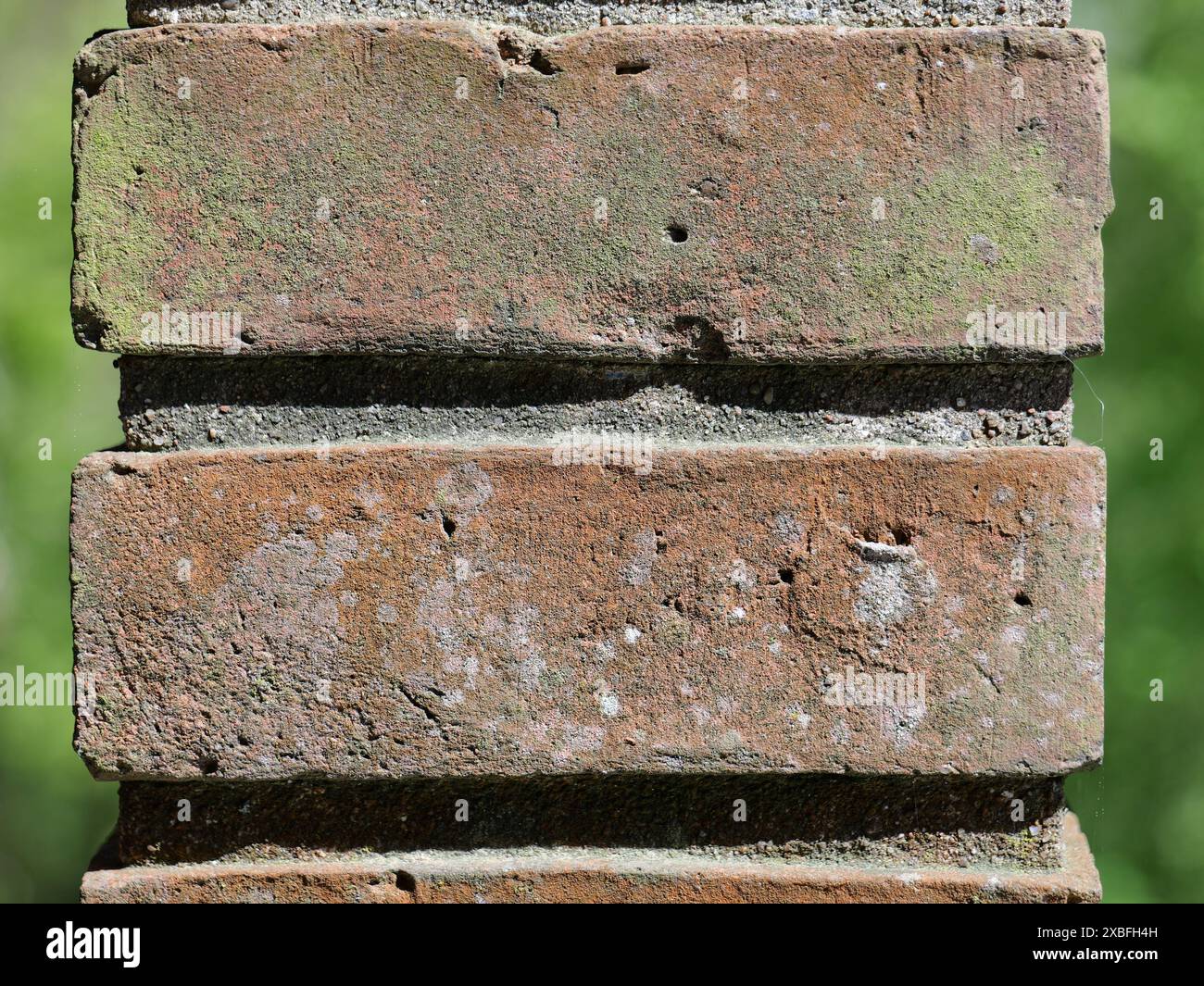 Characteristic brick masonry surfaces are ancient yet restored, a ...