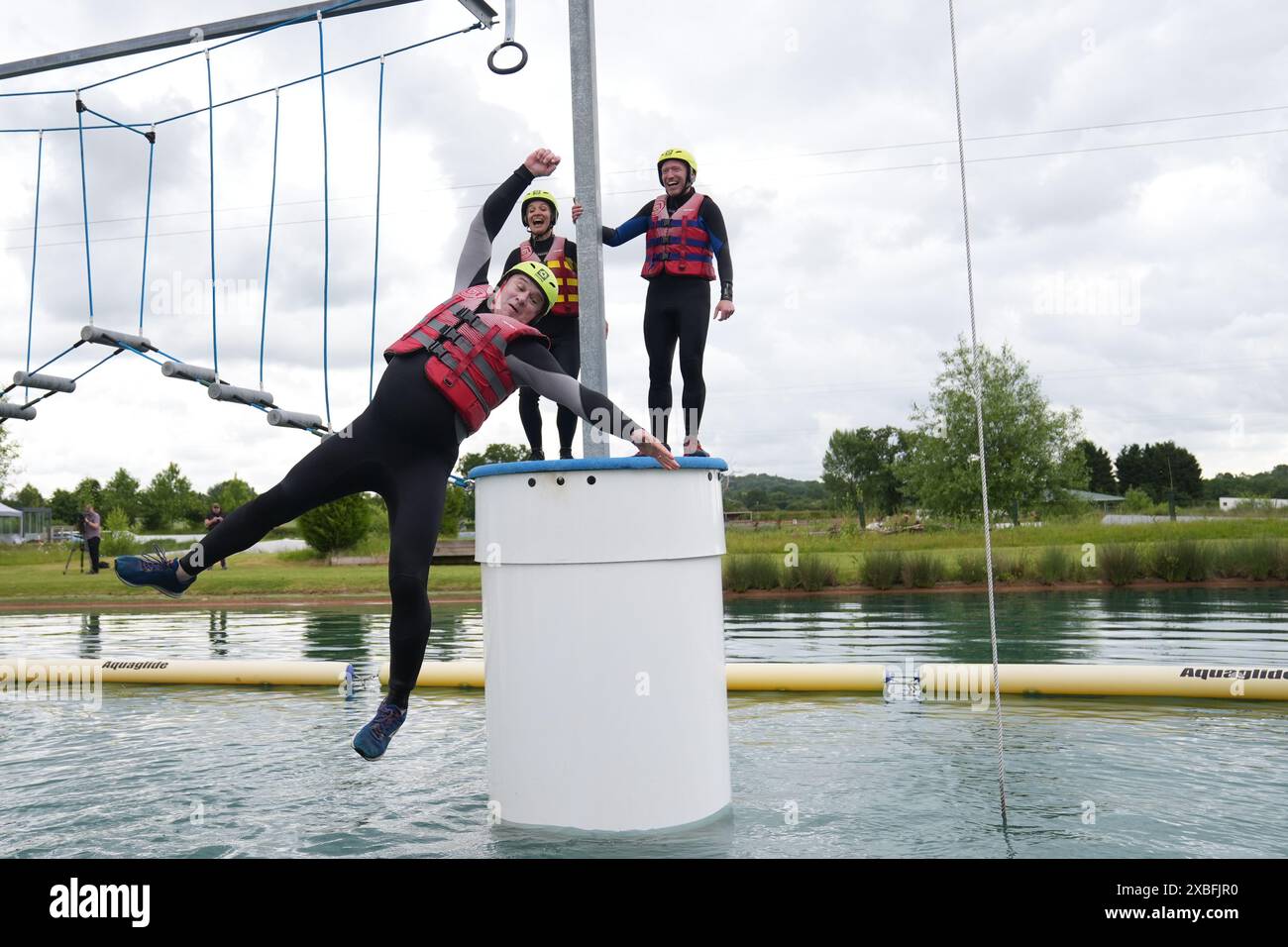 Liberal Democrats leader Sir Ed Davey falls as he attempts an Aqua ...