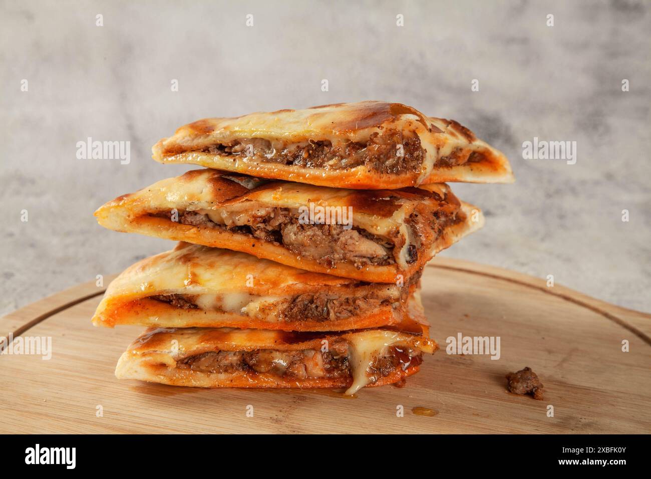 Stuffed chicken breaded naan flatbread cut in triangle pieces Stock ...