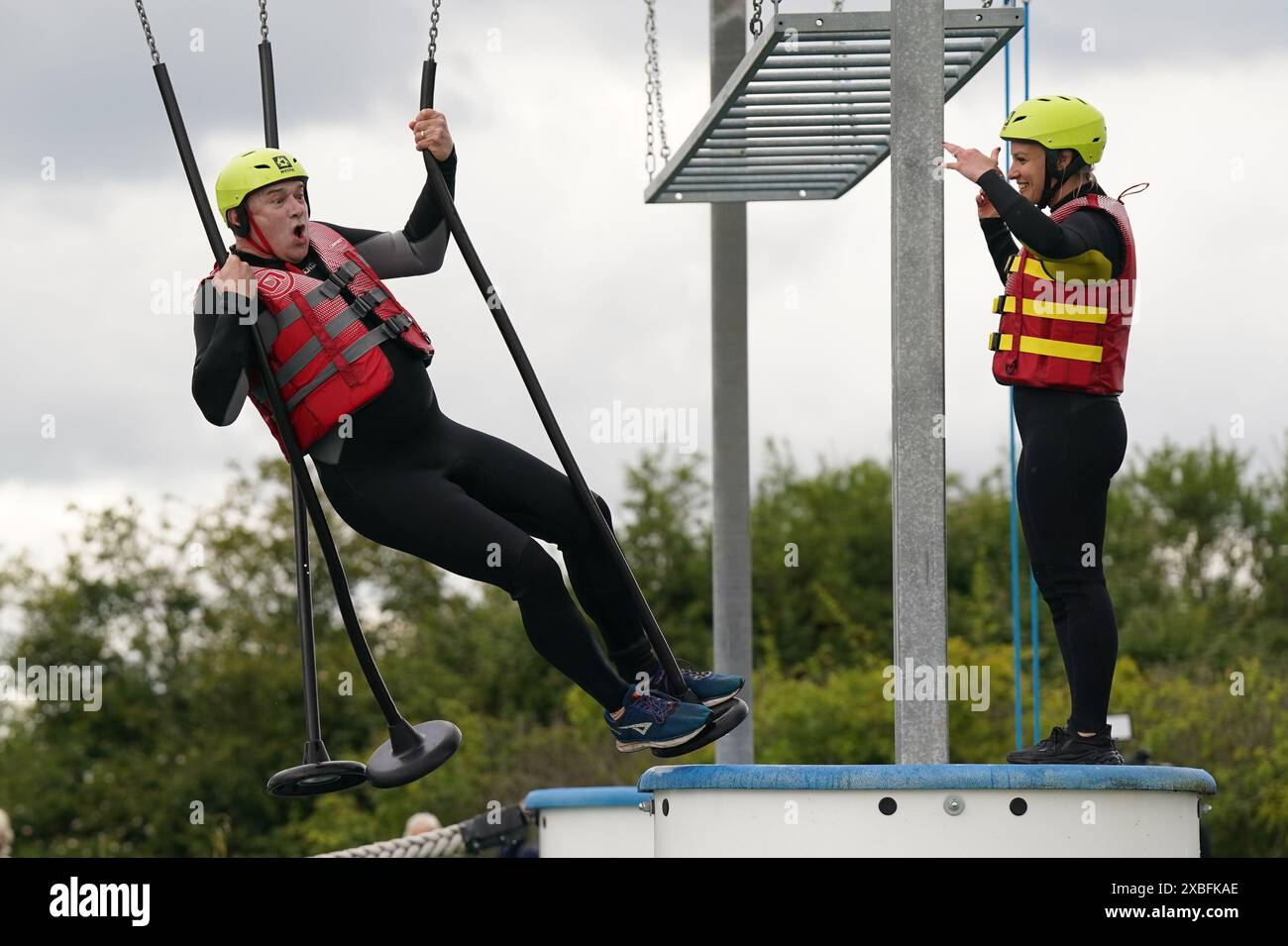 Liberal Democrats leader Sir Ed Davey attempts an Aqua Jungle floating ...