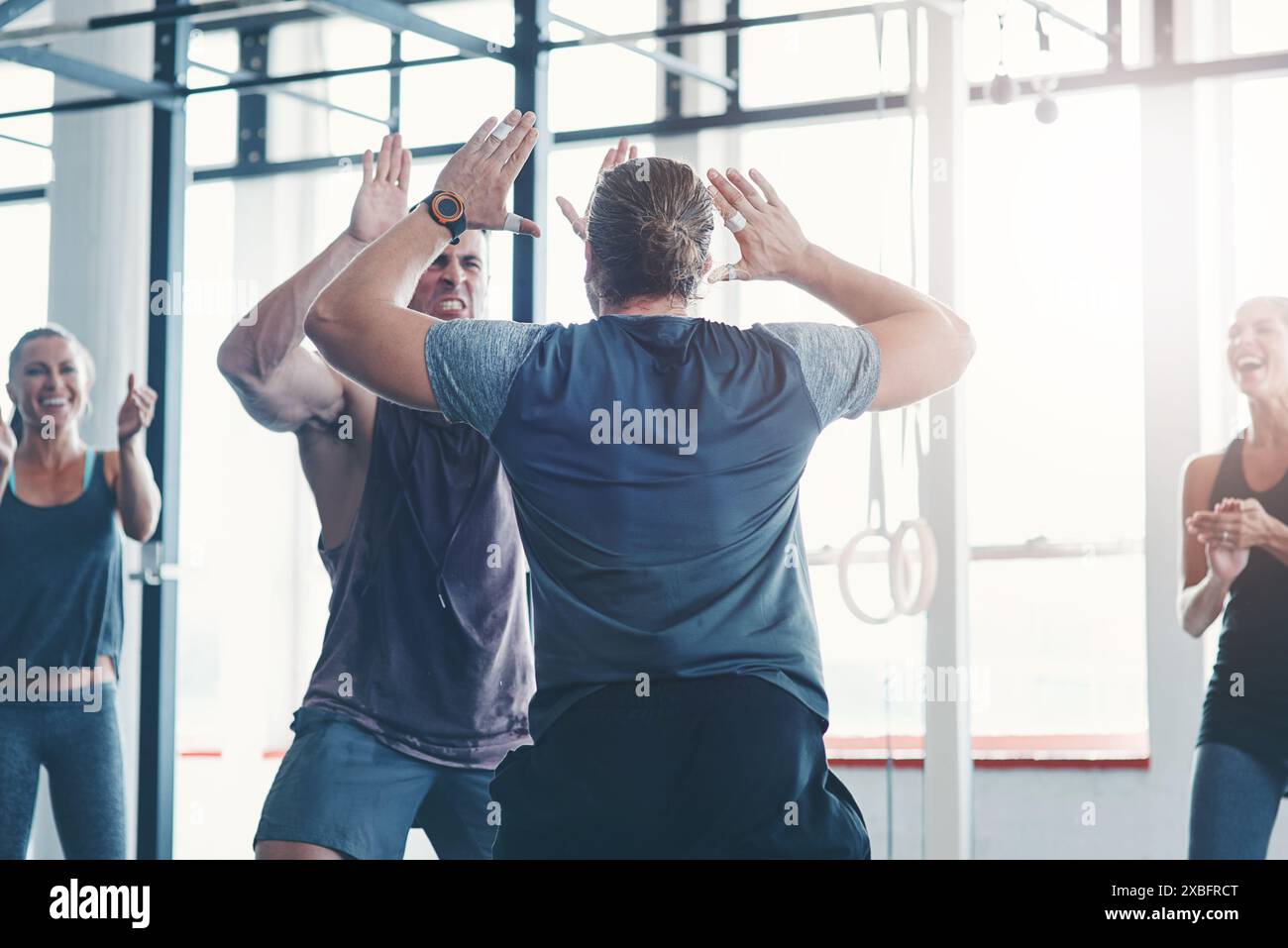 Celebration, gym and teamwork with high five, fitness and clapping for ...