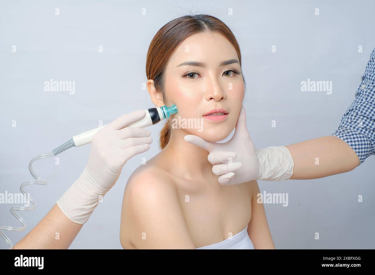 Beautiful Asian Woman Undergoing SilkPeel Facial Treatment Stock Photo ...