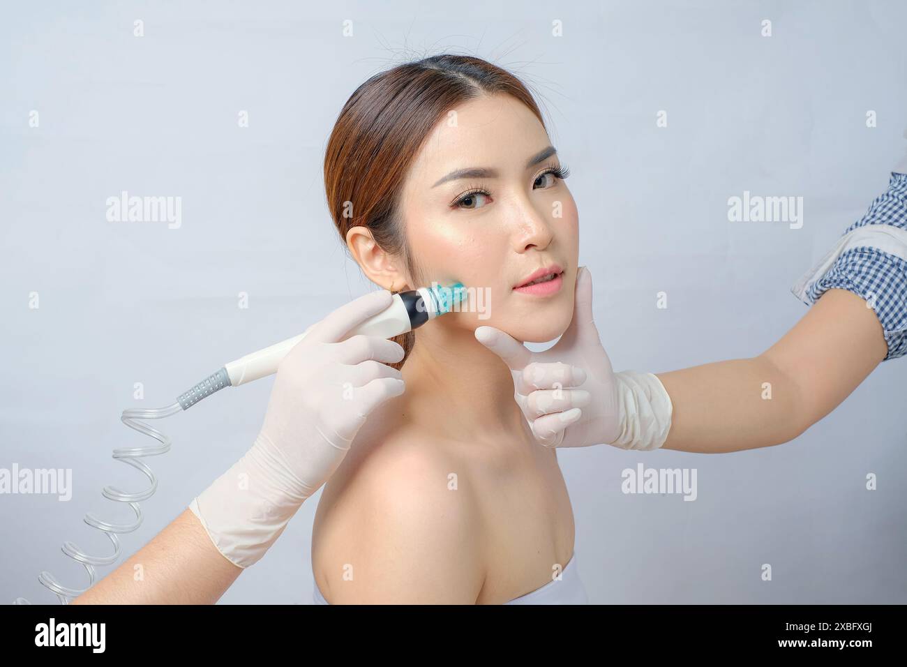 Beautiful Asian Woman Undergoing Skin Dermabrasion Facial Treatment ...