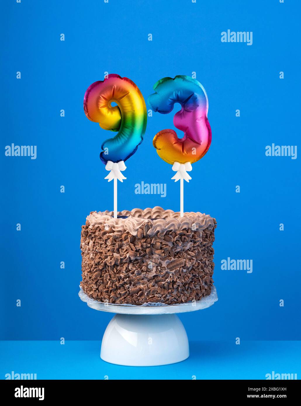 Air balloon number 93 - Birthday cake on blue background Stock Photo ...