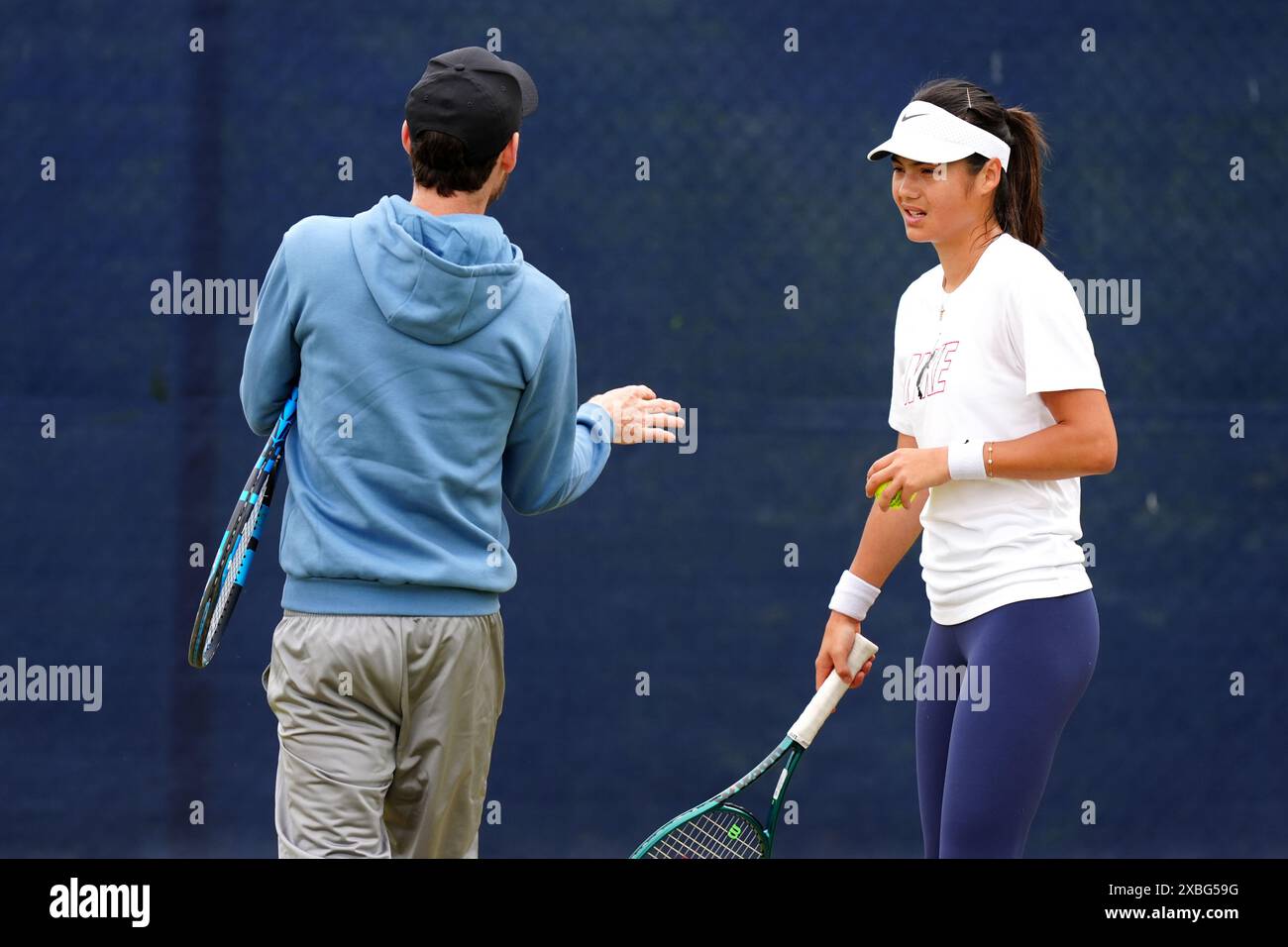 Emma Raducanu (right) with tennis coach Nick Cavaday during a practice ...