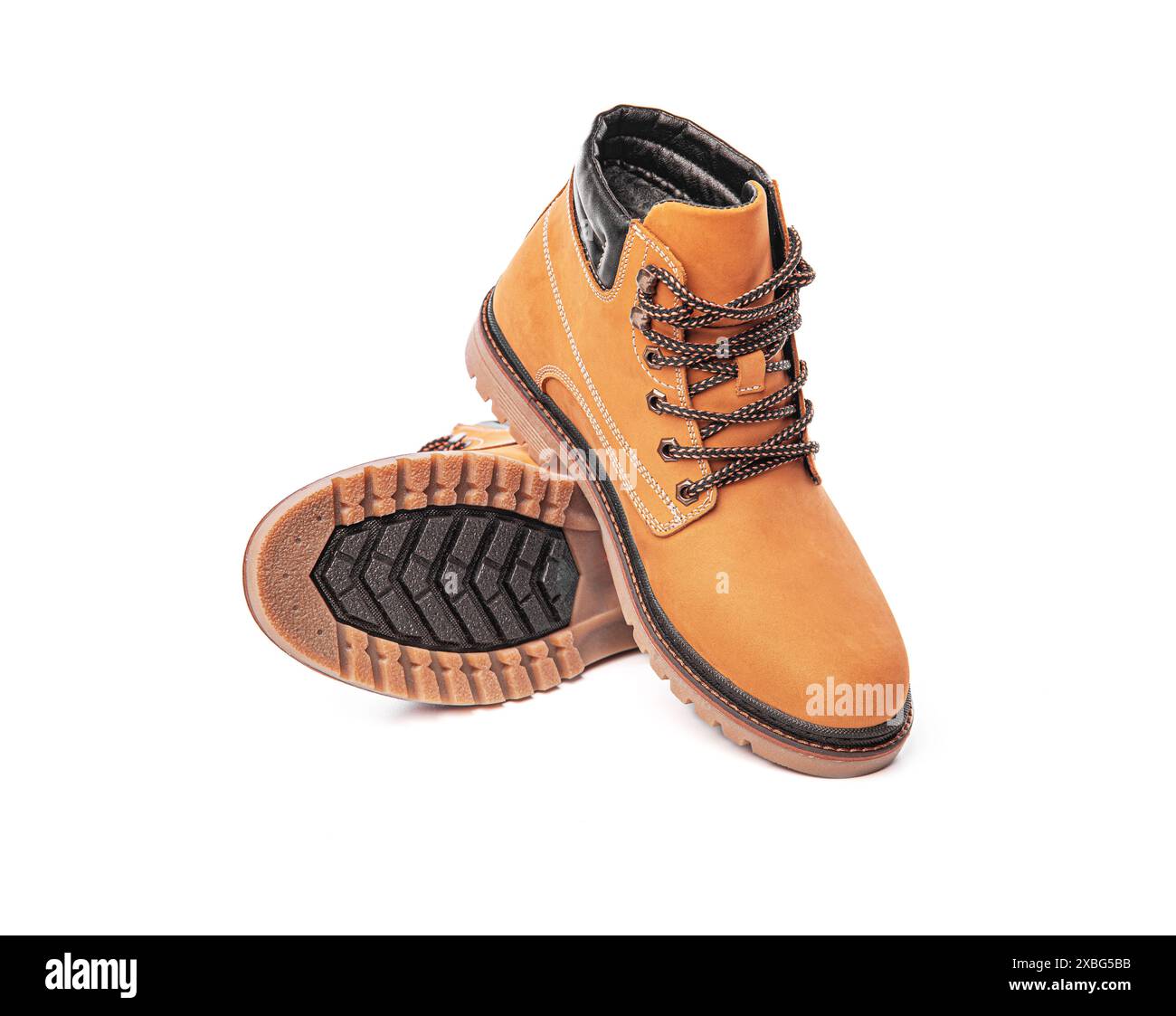 Yellow winter boot isolated on white Stock Photo - Alamy