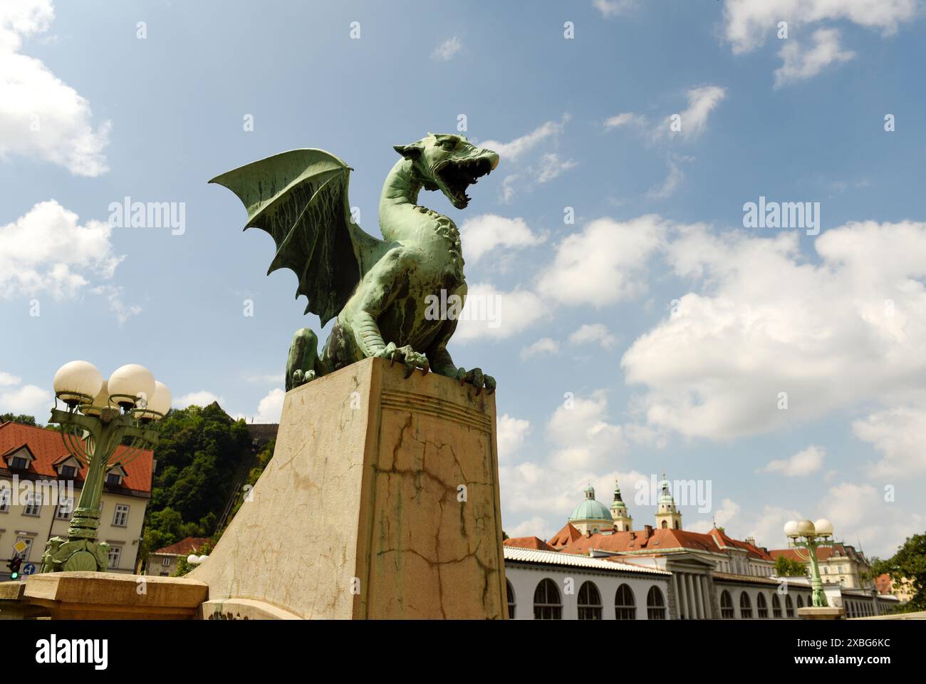 The Dragon statues at the Dragon Bridge and Cathedral of St. Nicholas ...