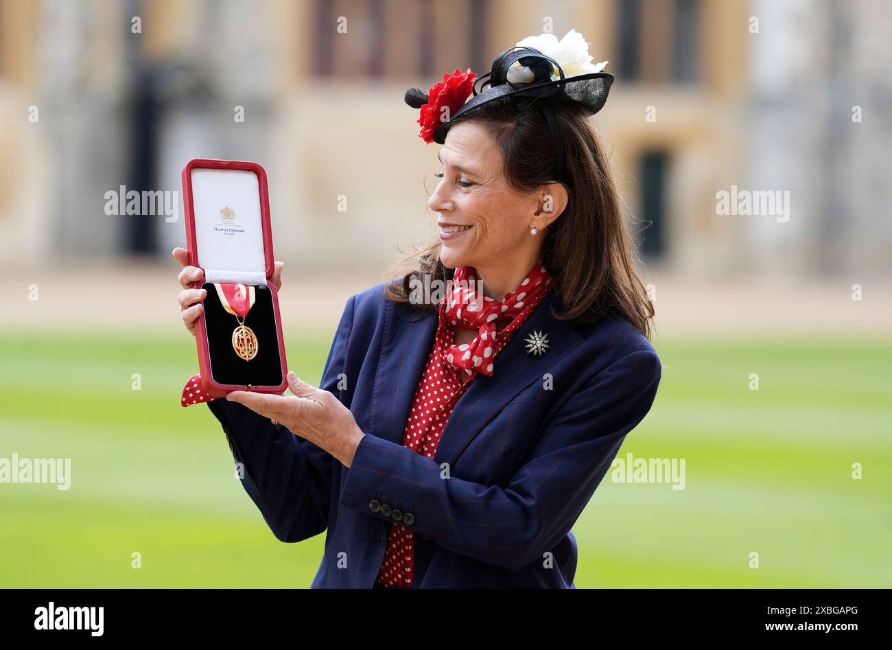 Lady Amis with the insignia of a Knight Bachelor conferred on her late ...