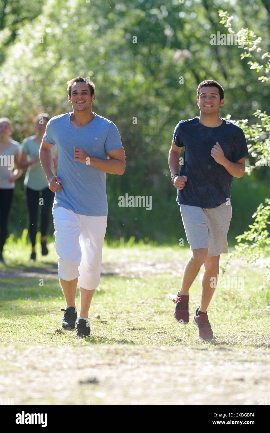 Men running on rural road hi-res stock photography and images - Alamy