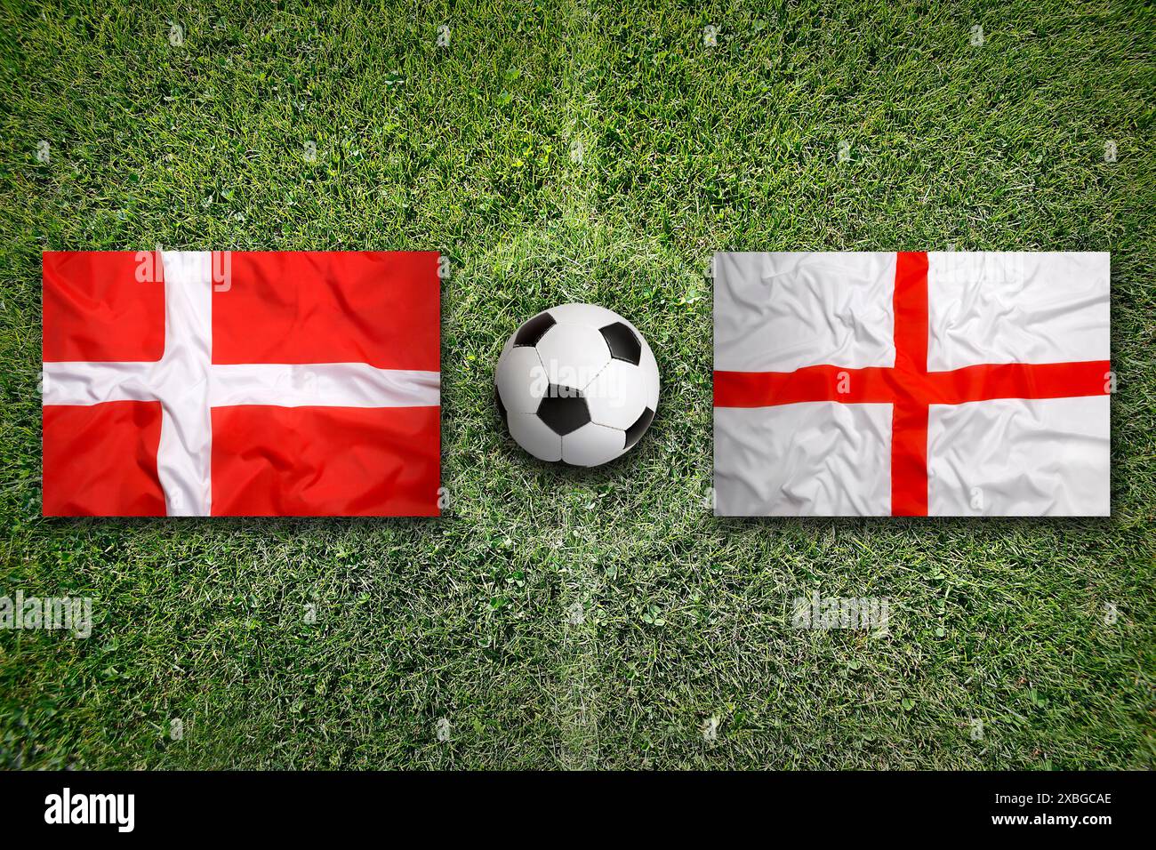 Denmark vs. England flags on green soccer field Stock Photo - Alamy