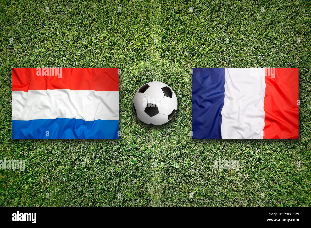 Netherlands vs. France flags on green soccer field Stock Photo - Alamy