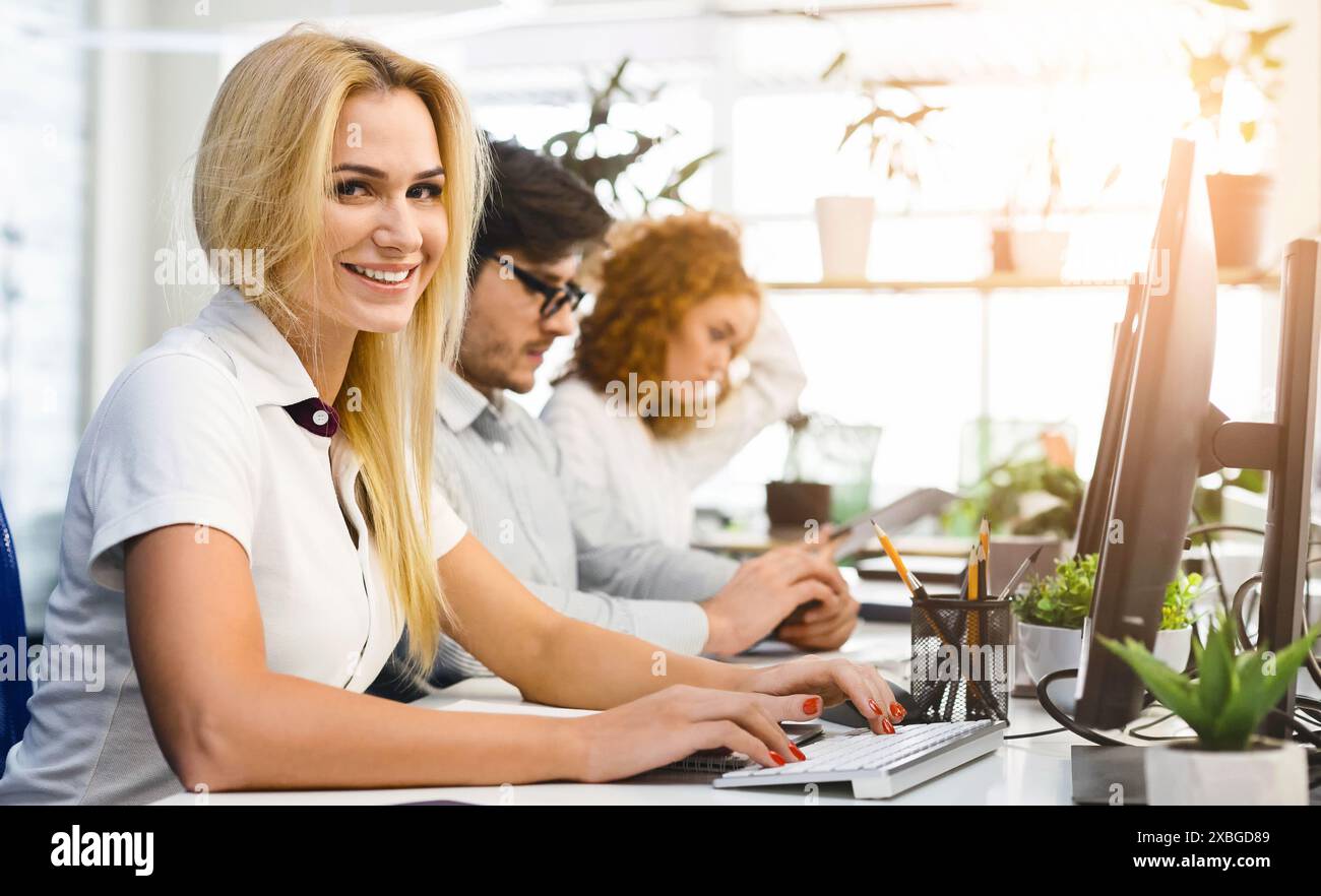 Technology team collaborating desk typing hi-res stock photography and ...