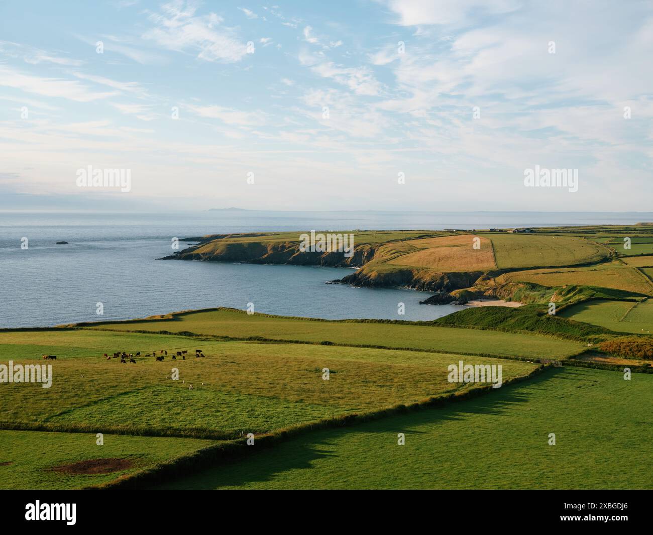 The summer farmland coastal landscape of the Llyn Peninsula at Mynydd ...