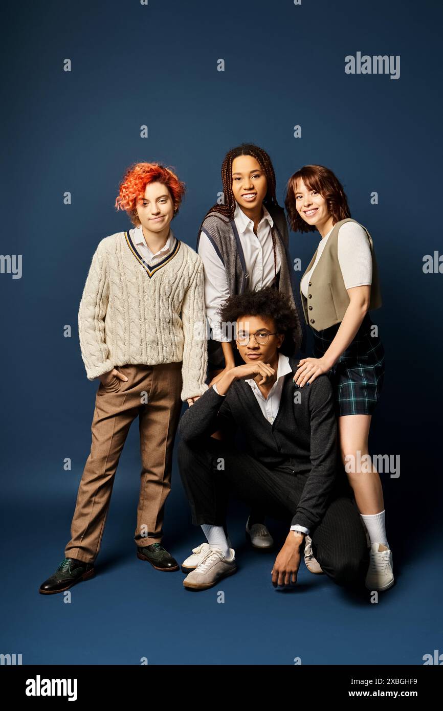 Multicultural friends, stand together in stylish attire on a dark blue ...