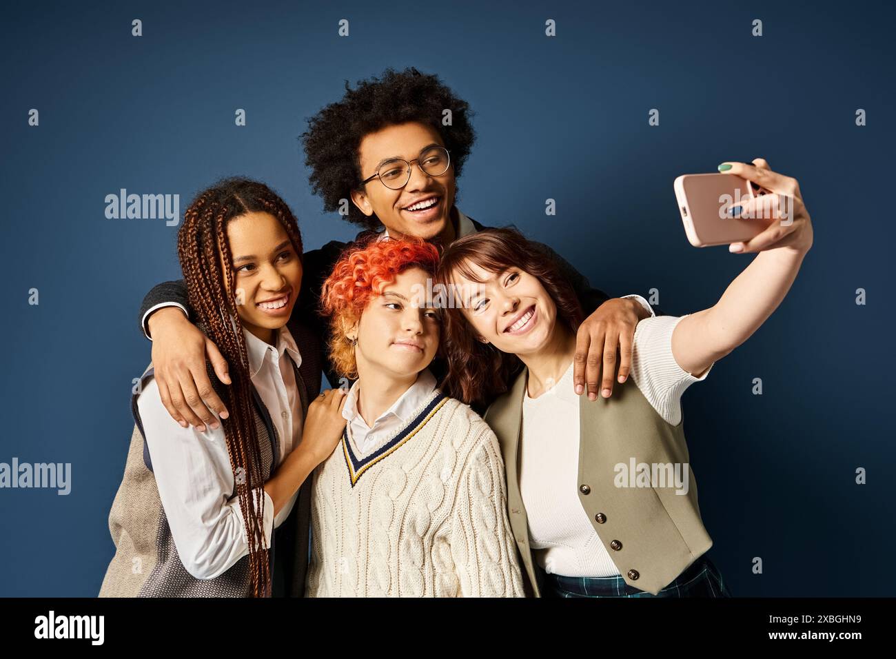 Multicultural friends, including a nonbinary individual, standing ...