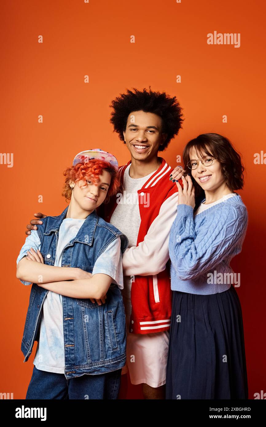 A group of young multicultural friends, including a nonbinary person ...