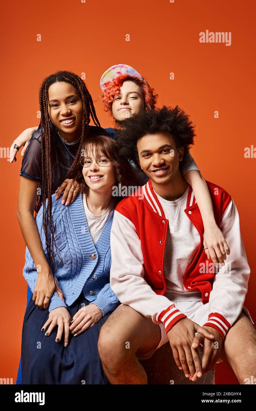 interracial young friends, including a nonbinary individual, sitting ...