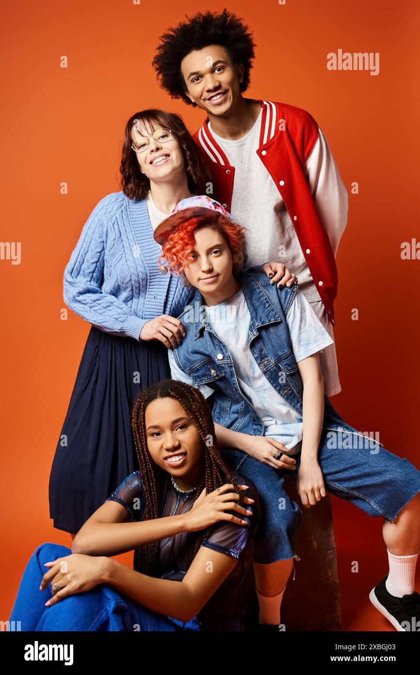 A diverse group of young friends, including a nonbinary person, posing ...