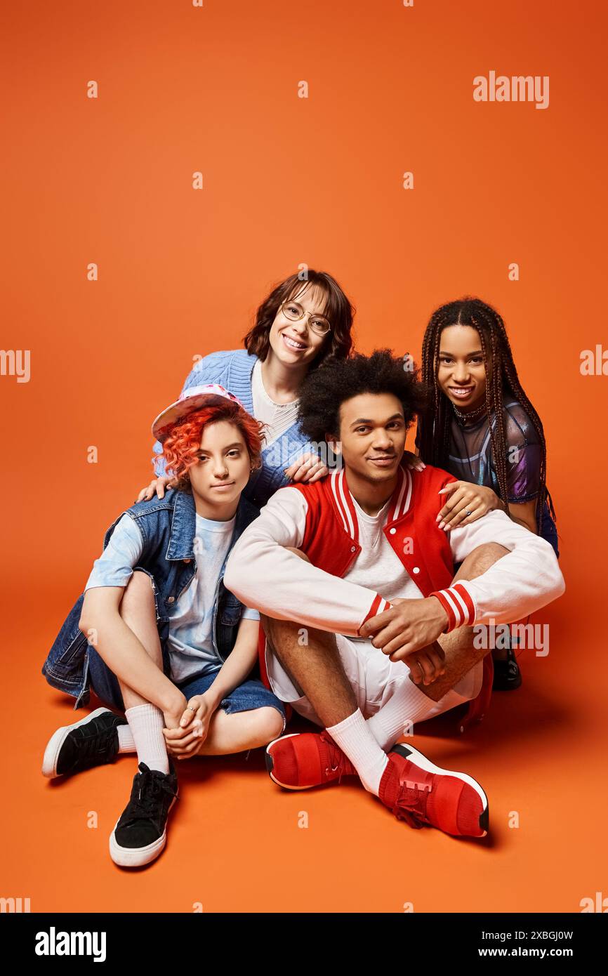 A group of young multicultural friends, including a nonbinary person ...