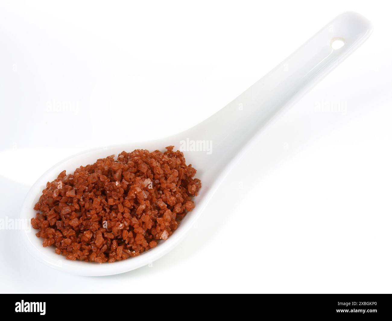 Red Stone Salt on white Background Stock Photo - Alamy