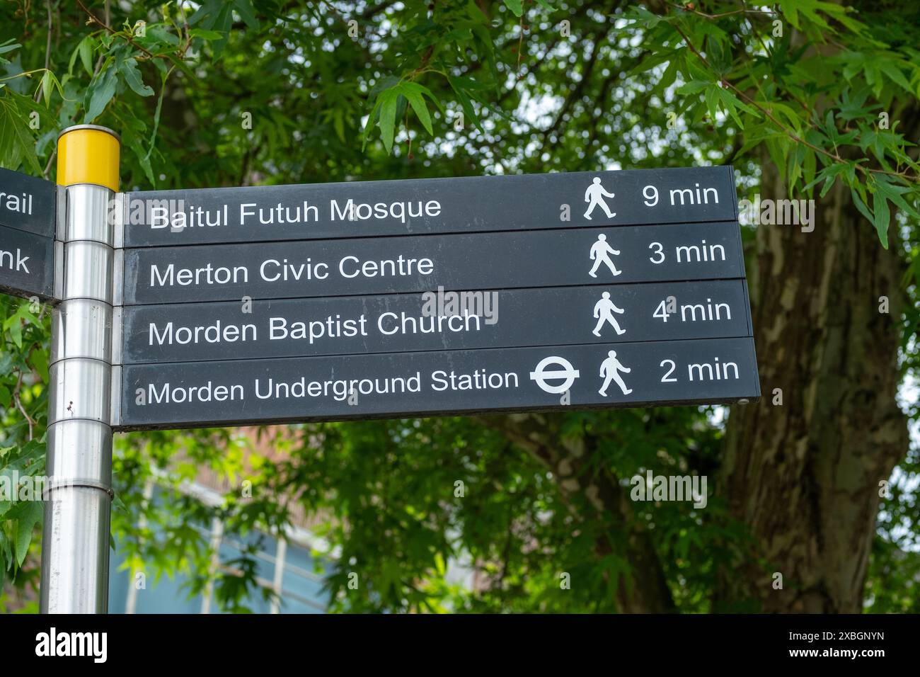 LONDON- JUNE 10, 2024: Pedestrian direction street sign for Baitul ...