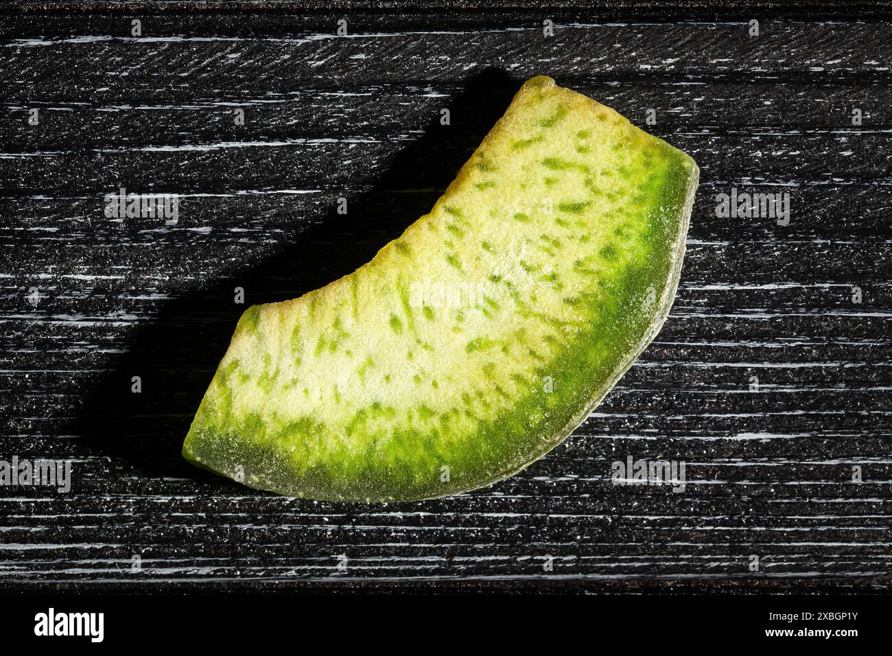 dry pomelo on black wood background top view Stock Photo - Alamy