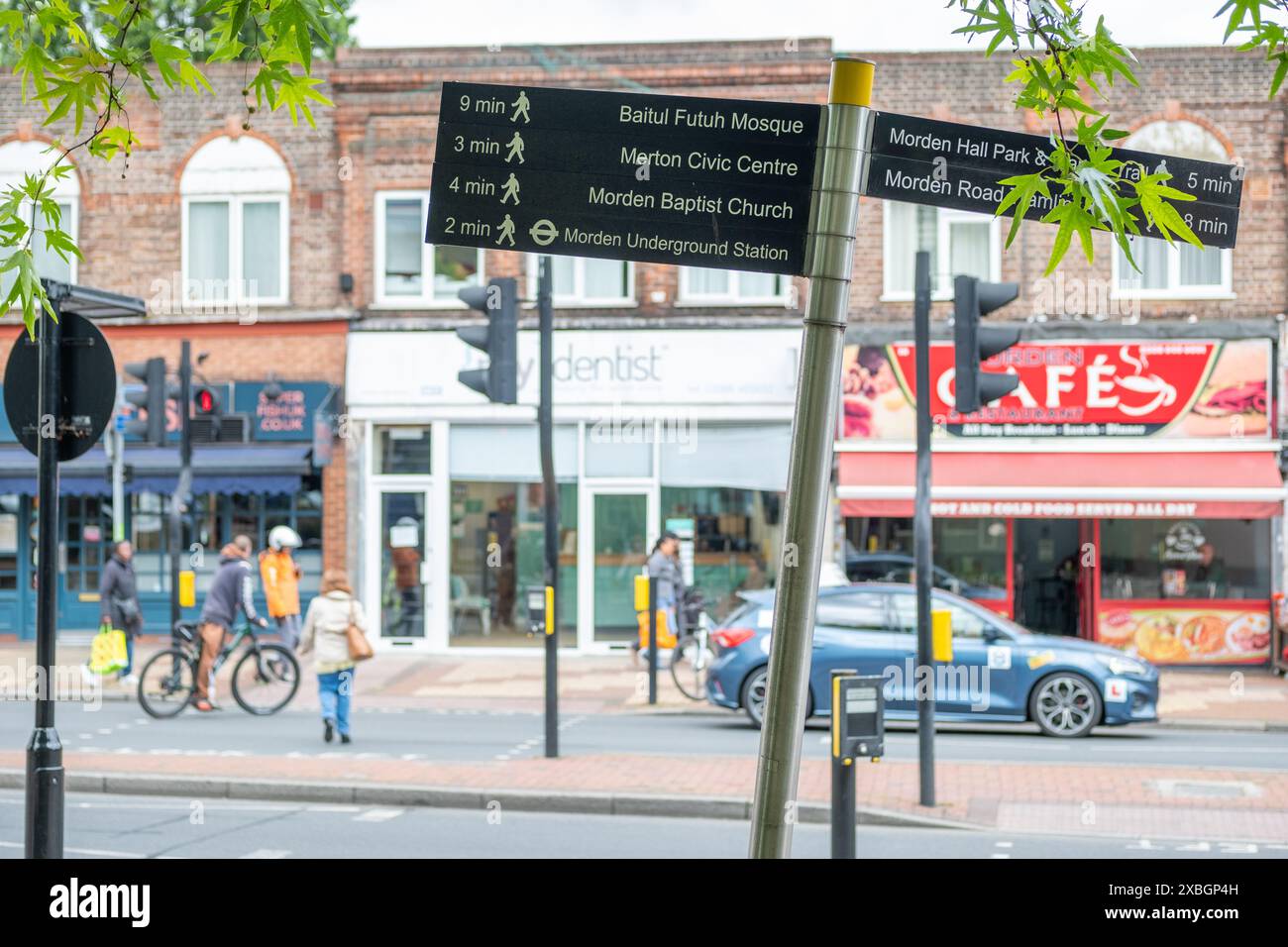 LONDON- JUNE 10, 2024: Pedestrian direction street sign for Baitul ...