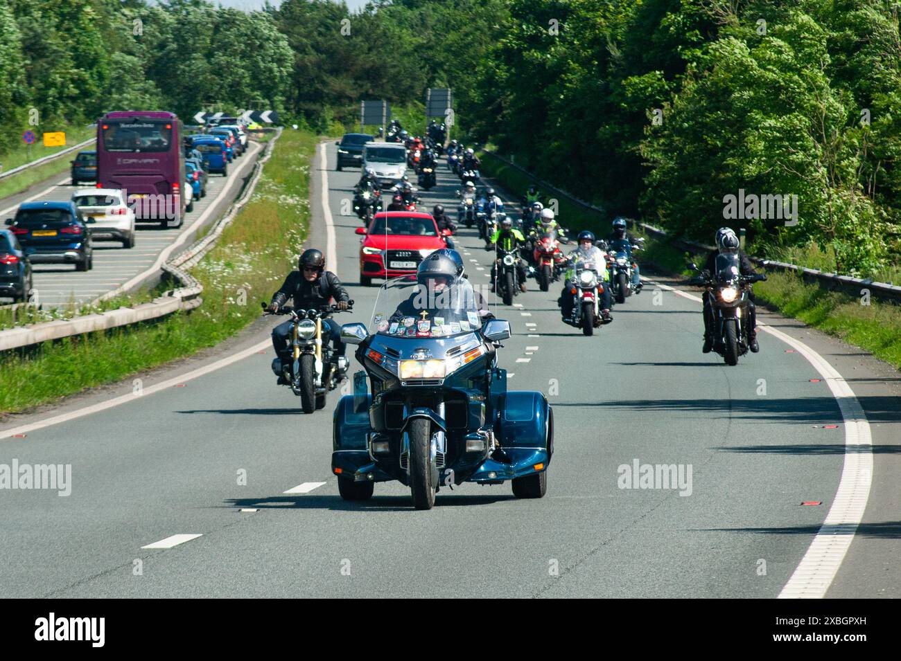 Motorcycles in Convoy on the memorial ride for Hairy Biker Dave Myers June 2024 Stock Photo - Alamy