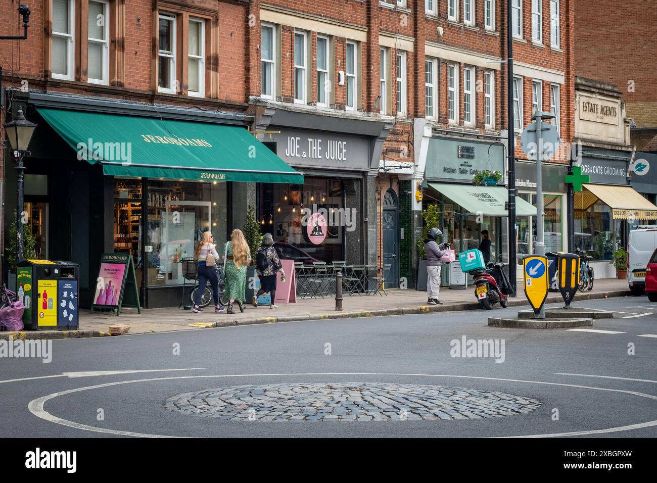 LONDON- JUNE 11, 2024: Wimbledon Village High Street shops. Retail ...