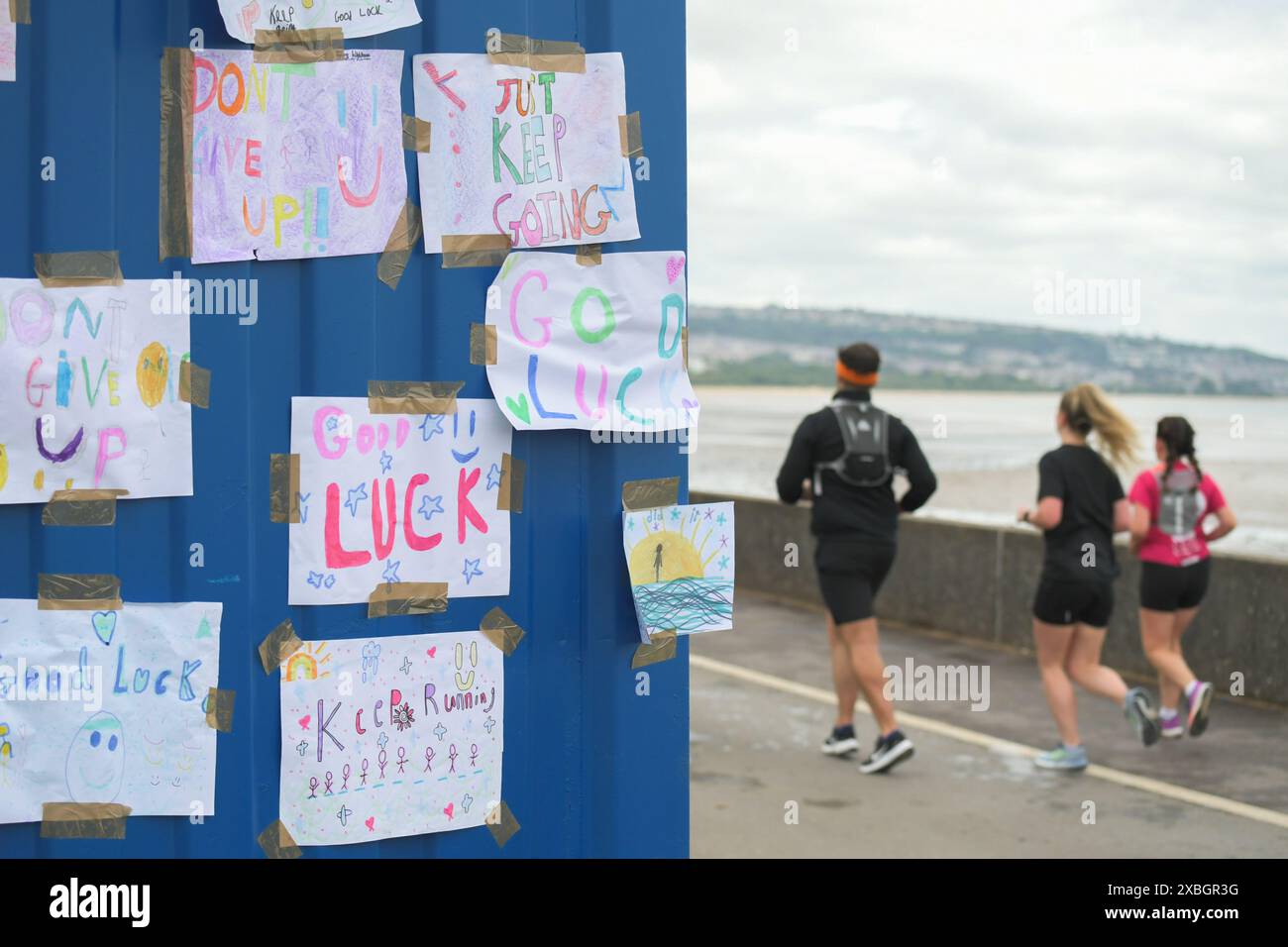 The motivational children's poster with runners running in the ...