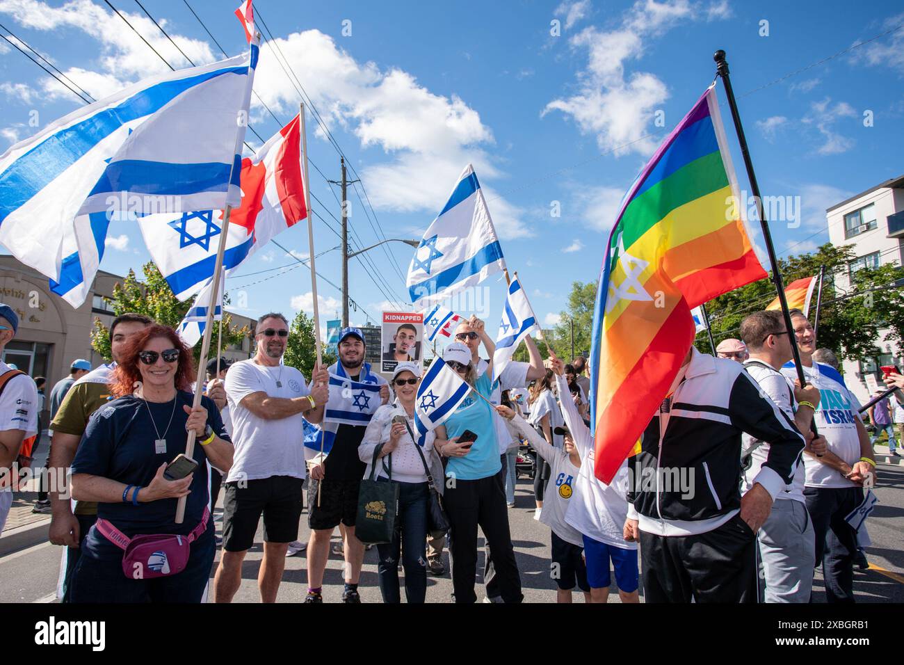 People hold Israel, Canada and Pride flag during UJA (United Jewish ...