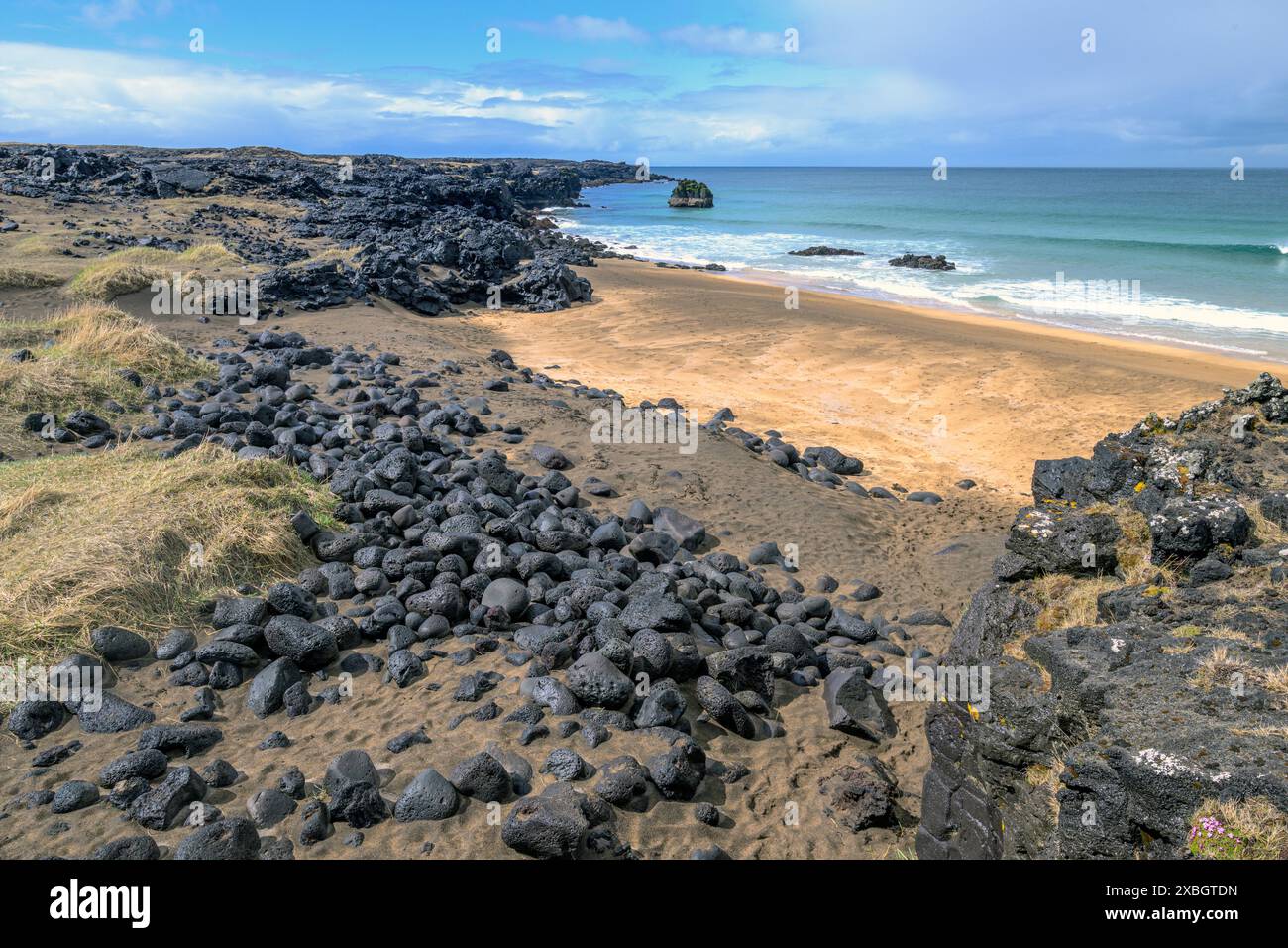 Beach and lave boulders at Skardsvik (western Snaefellsnes Peninsula ...