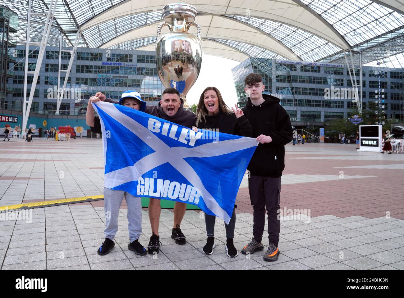 Scotland fans next to giant trophy outside Munich Airport. Germany will ...